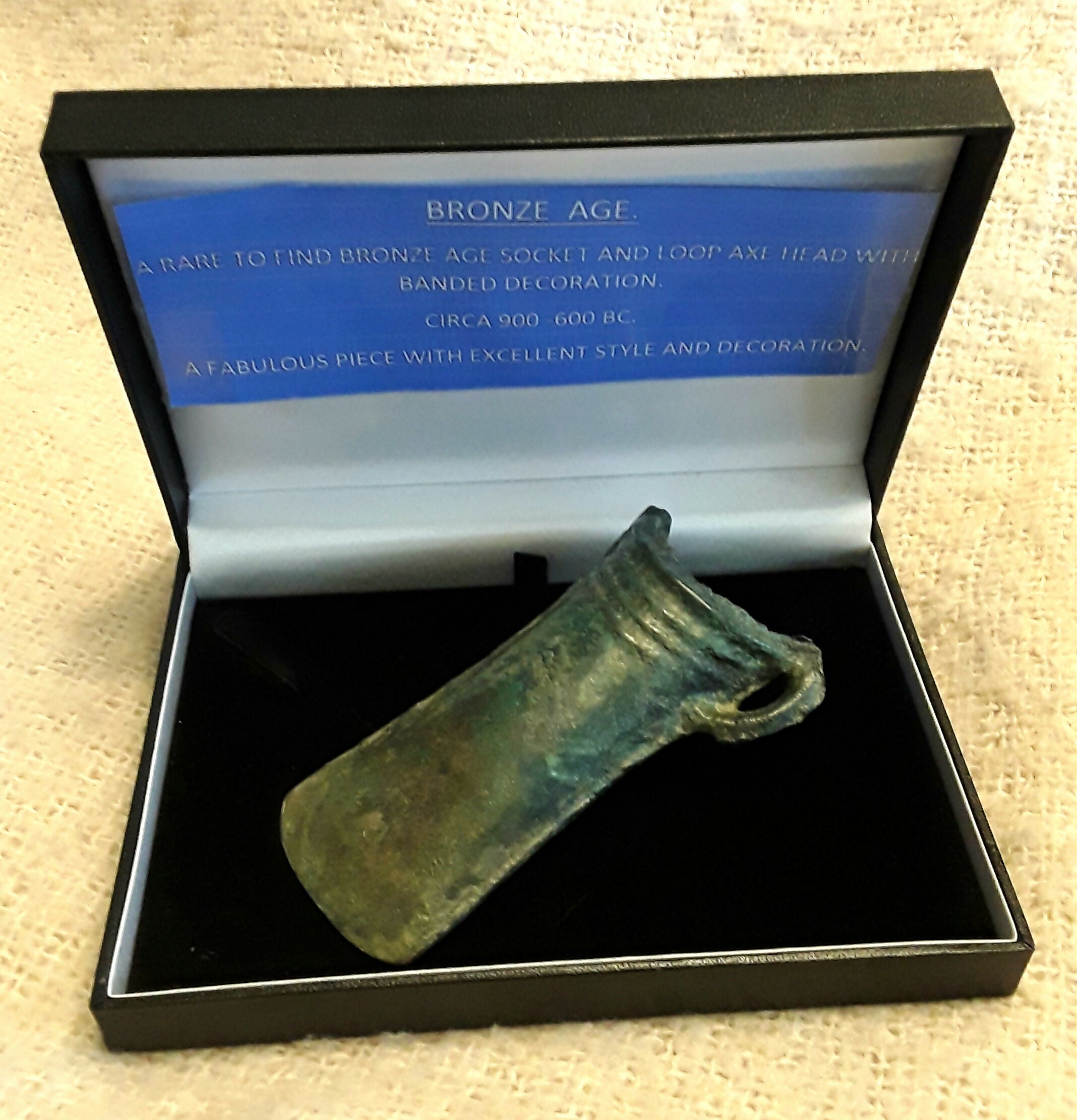 A Bronze Age Socket And Loop Axe Head.